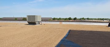 The Purpose of Stone or Gravel Ballast on a Commercial Roof | Roberts ...