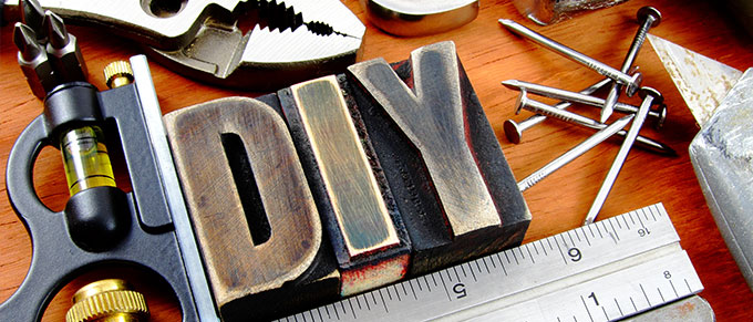 Hiring a Professional Roofer vs. DIY Commercial Roof Replacement